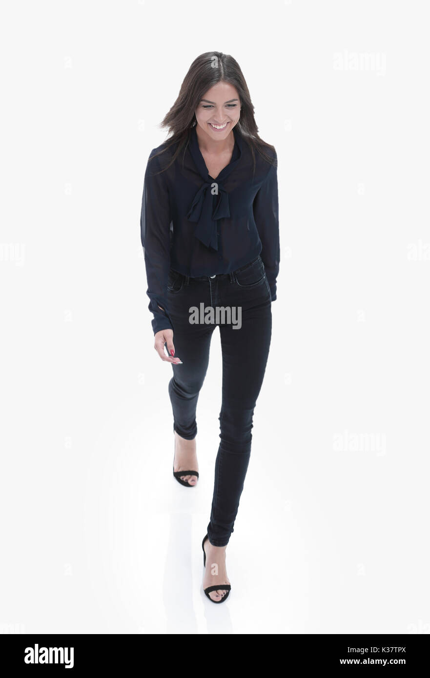 modern young business woman confidently moving forward. photo in full ...