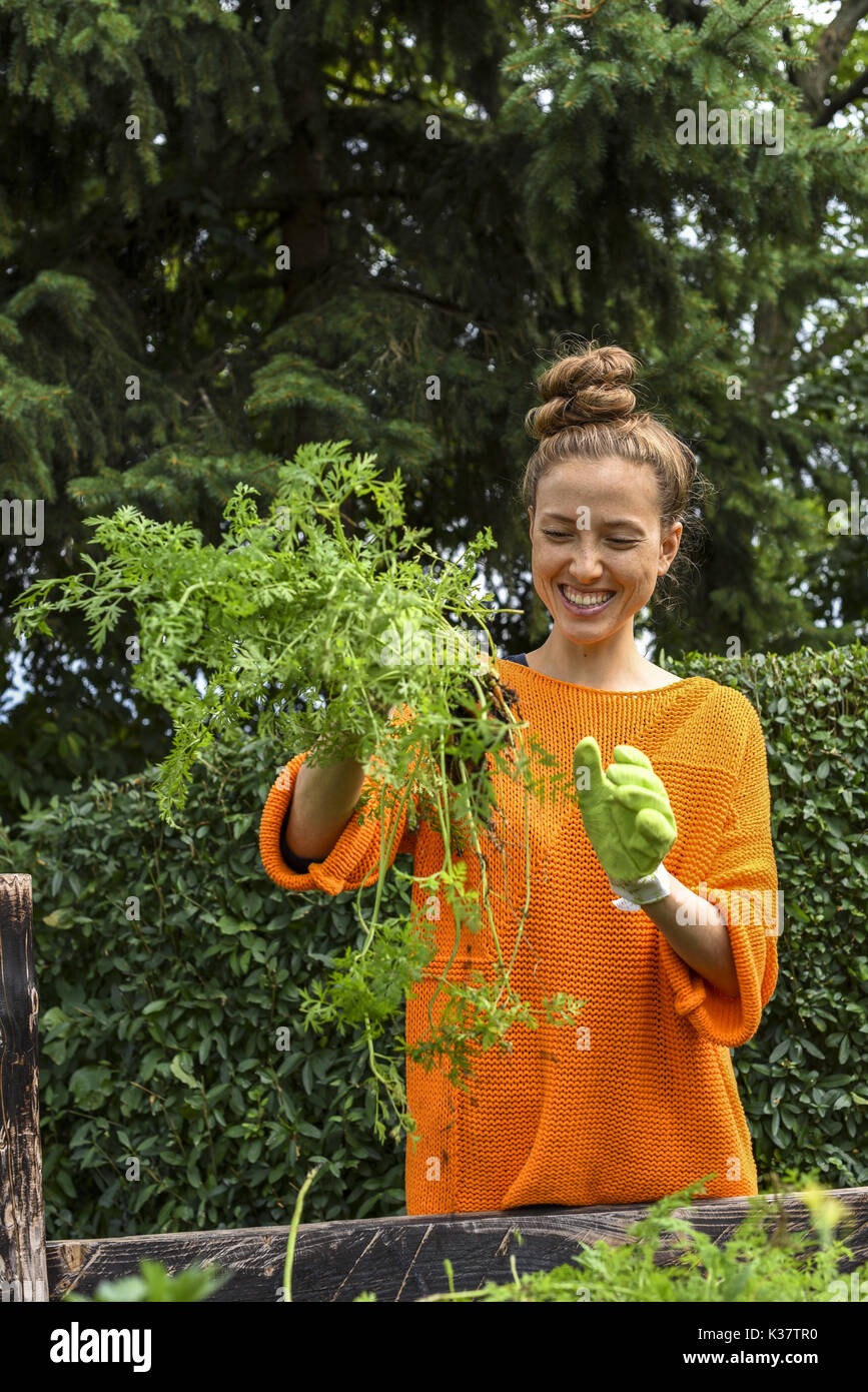 Yound woman in her garden, near Vienna, Austria (model-released Stock ...