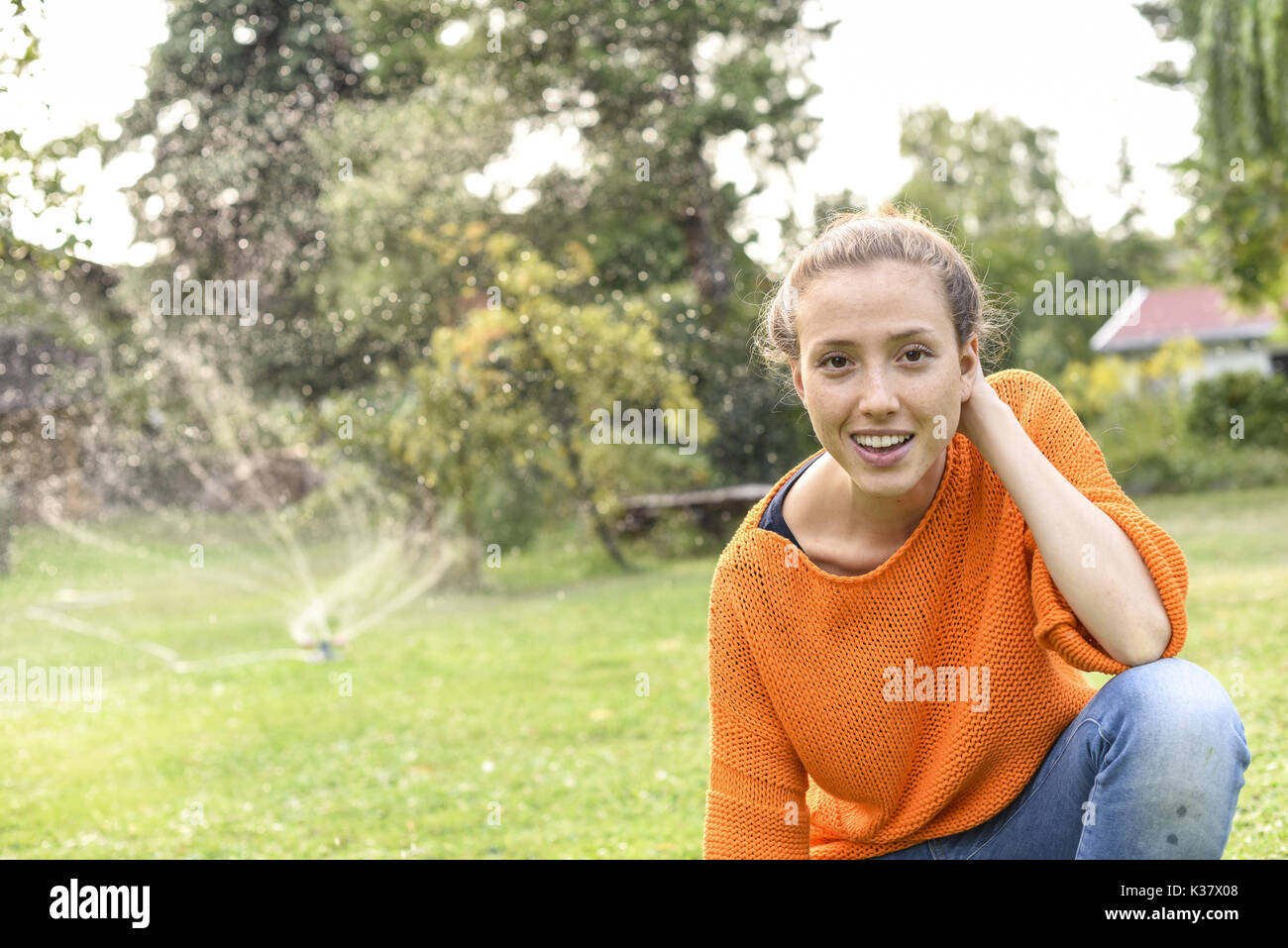 Yound woman in her garden, near Vienna, Austria (model-released Stock ...