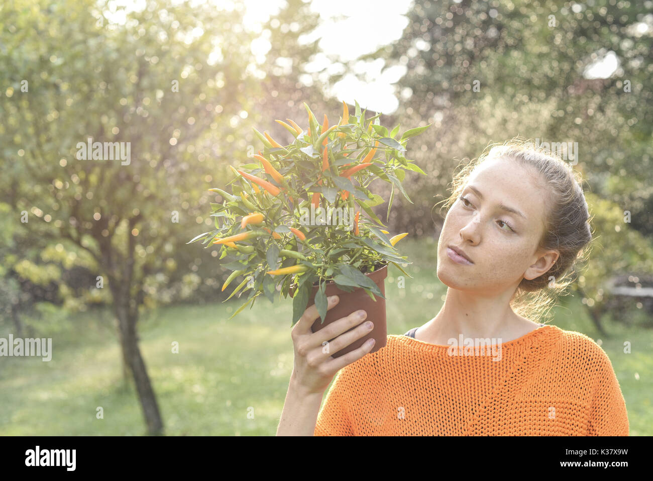 Yound woman in her garden, near Vienna, Austria (model-released Stock ...