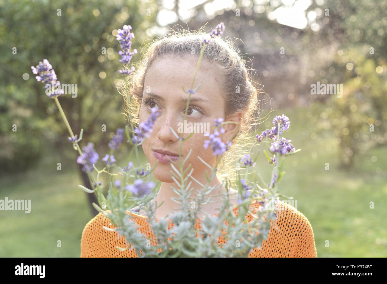 Yound woman in her garden, near Vienna, Austria (model-released Stock ...