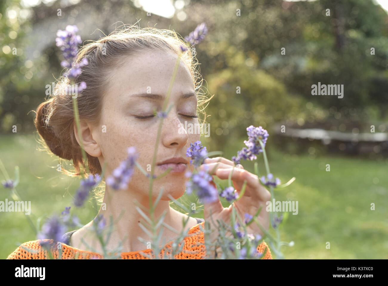 Yound woman in her garden, near Vienna, Austria (model-released Stock ...