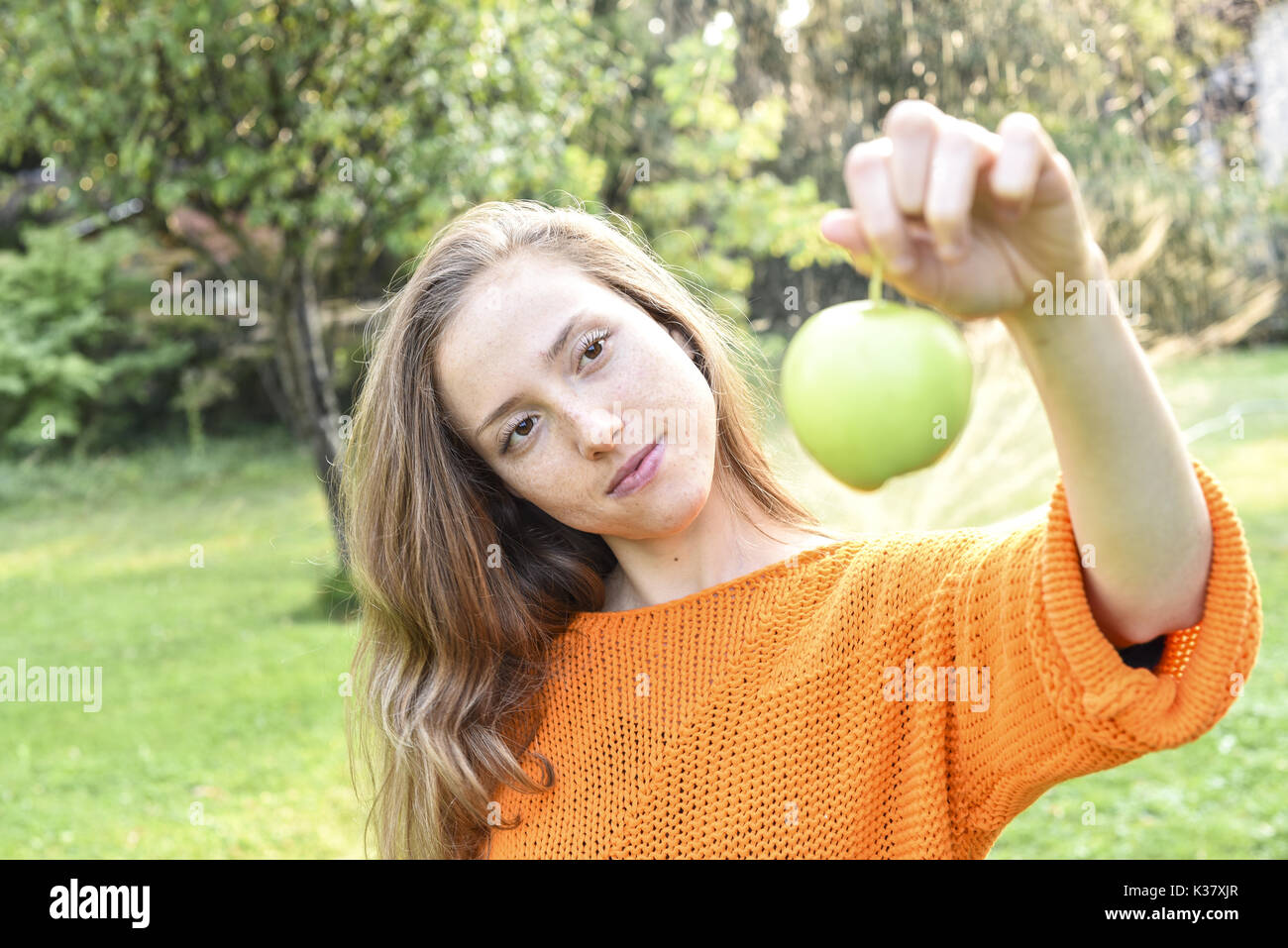 Yound woman in her garden, near Vienna, Austria (model-released Stock ...