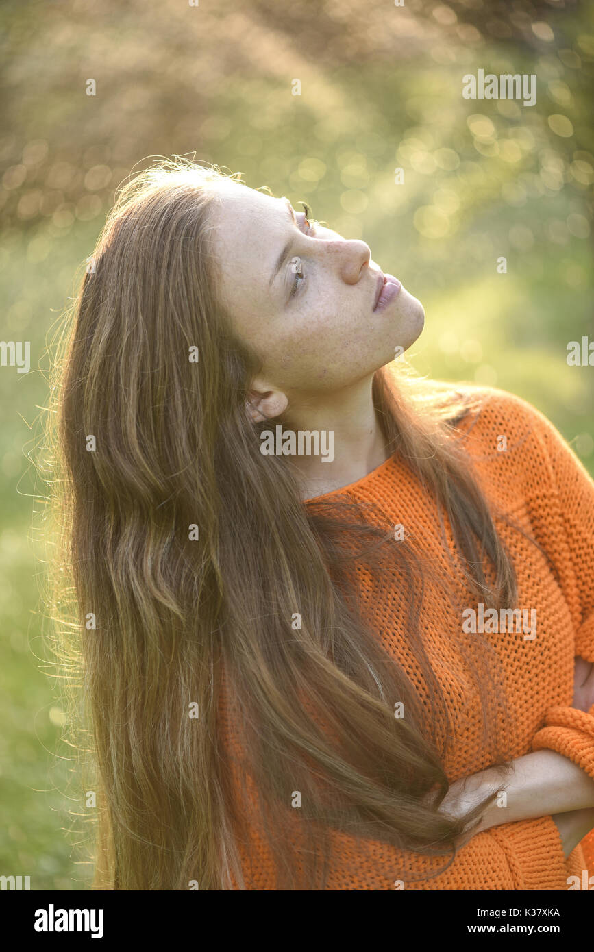 Yound woman in her garden, near Vienna, Austria (model-released Stock ...
