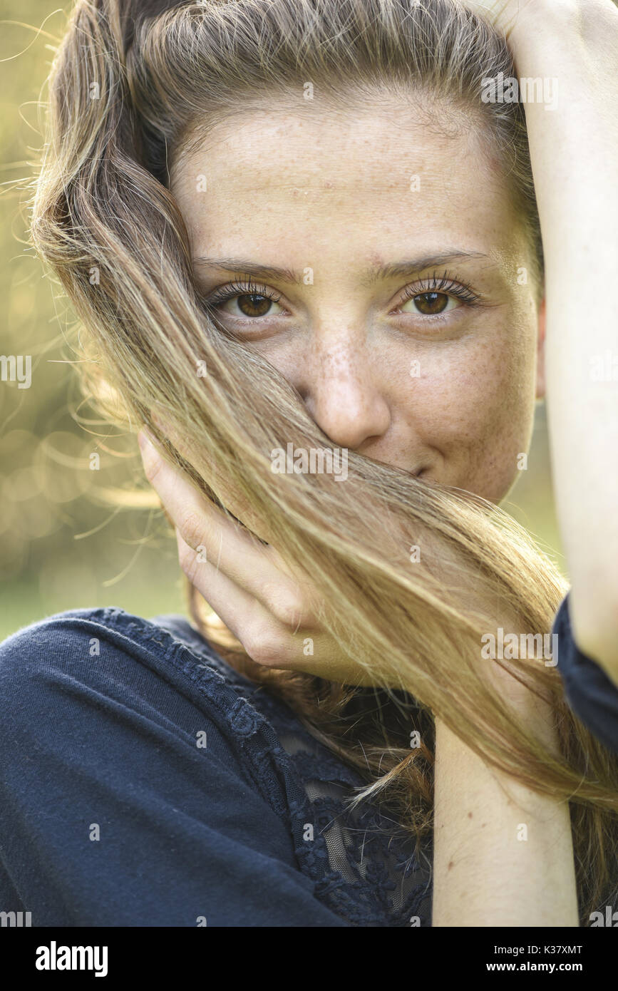 Yound woman in her garden, near Vienna, Austria (model-released Stock ...
