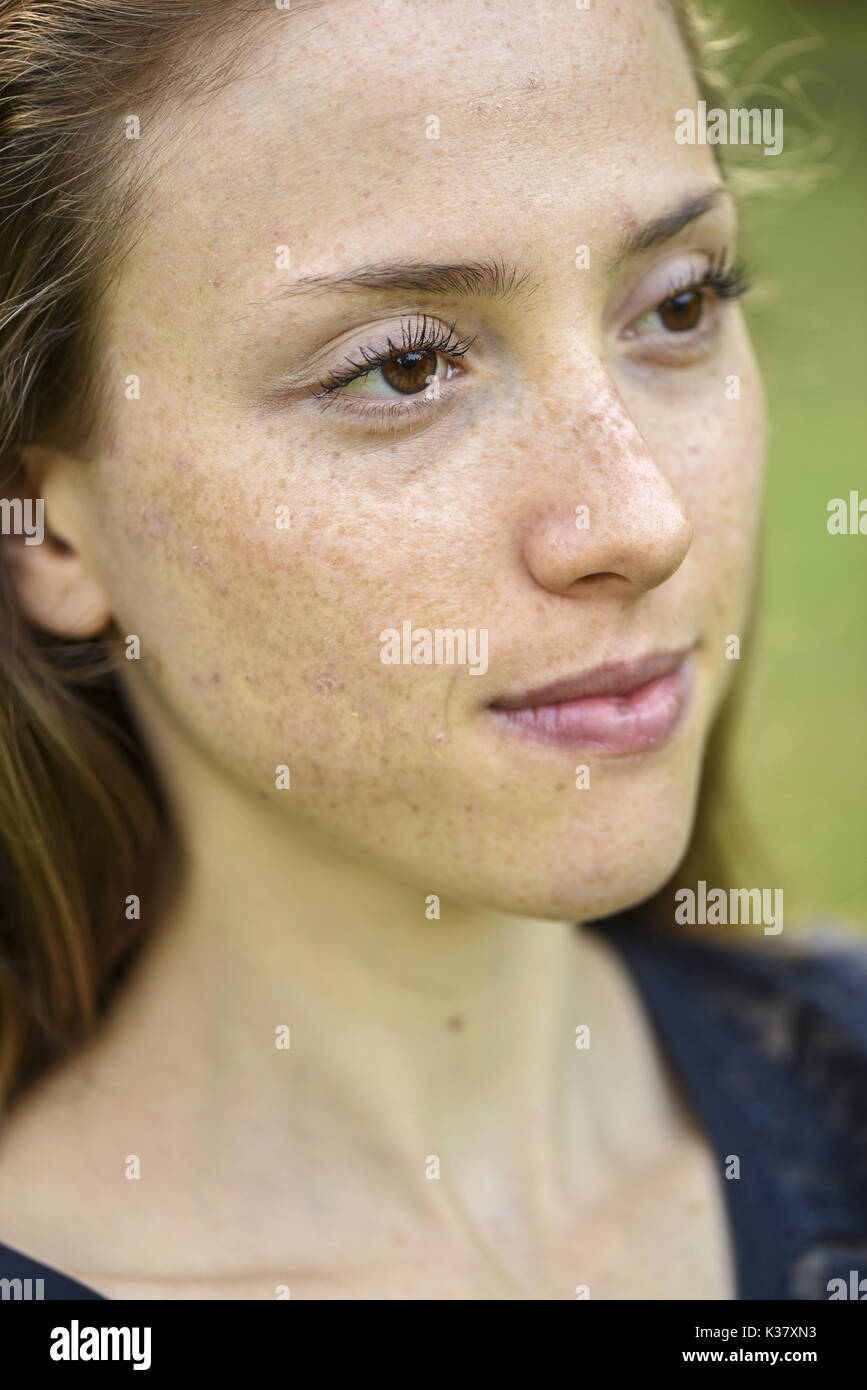 Yound woman in her garden, near Vienna, Austria (model-released Stock ...