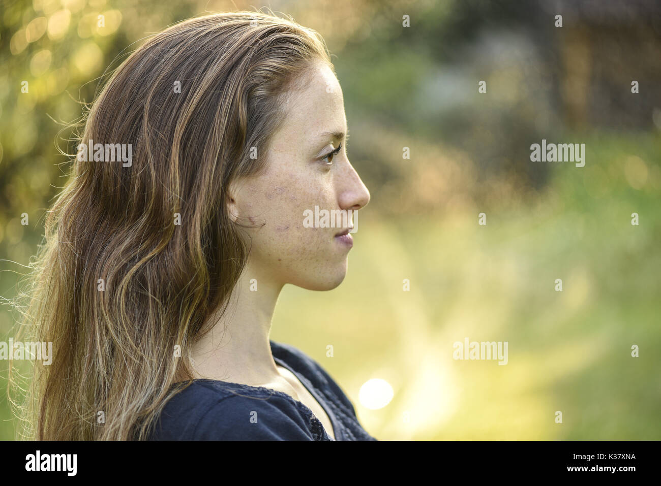Yound woman in her garden, near Vienna, Austria (model-released Stock ...