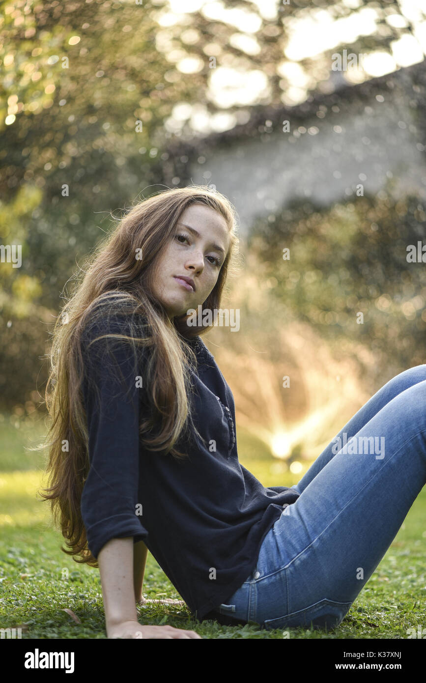 Yound woman in her garden, near Vienna, Austria (model-released Stock ...