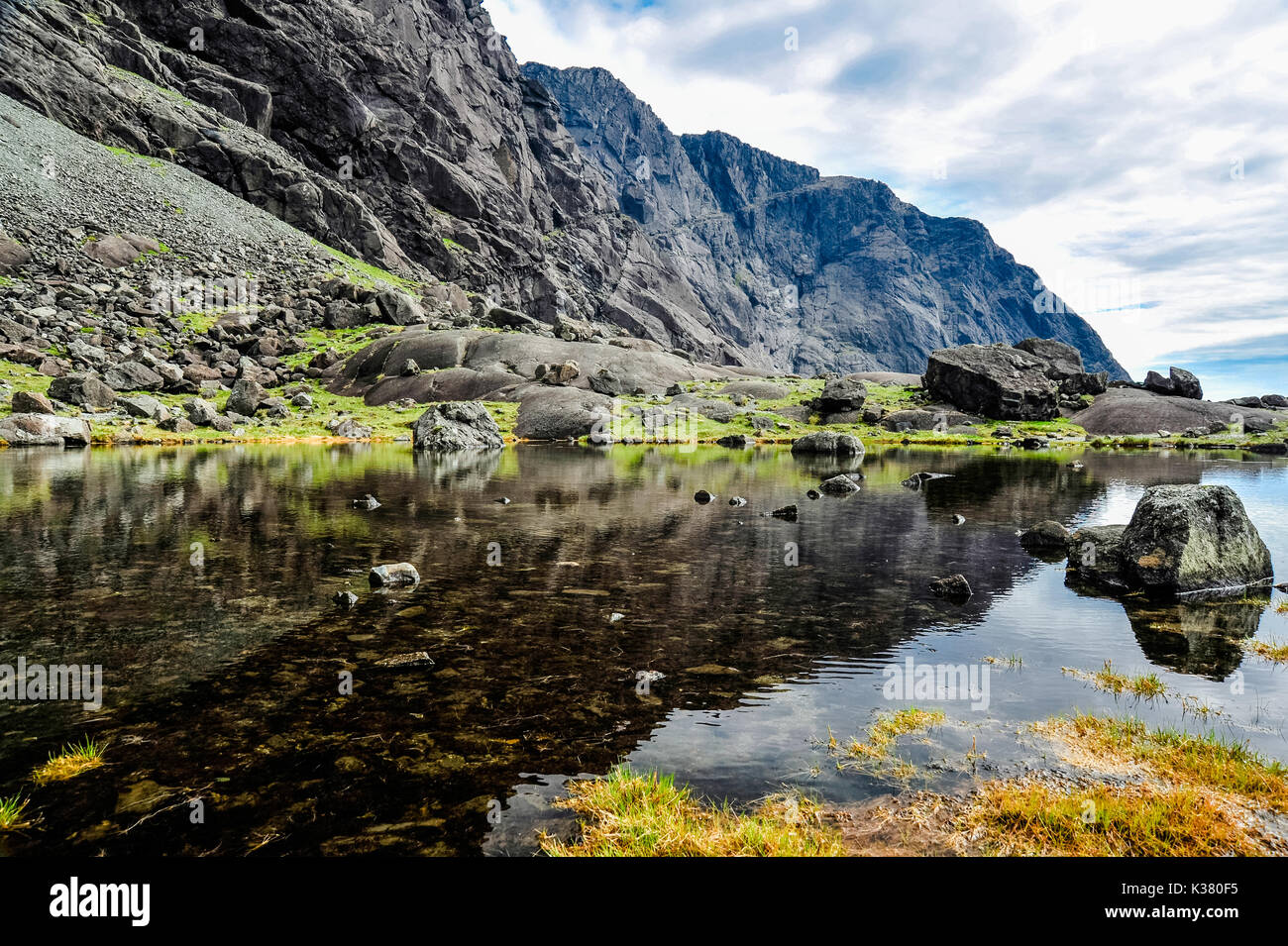 Mountain reflection in Coire Lagan, Isle of Skye, Scotland Stock Photo ...