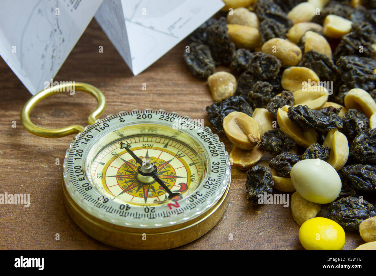 Hiking compass on map hi-res stock photography and images - Alamy