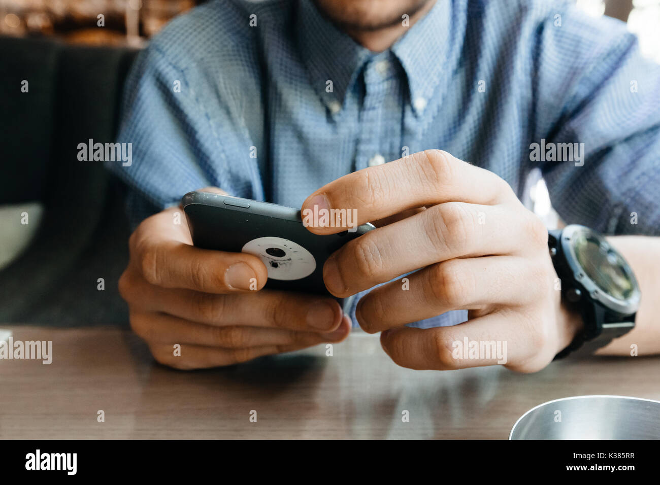 Male hands using smart hi-res stock photography and images - Alamy