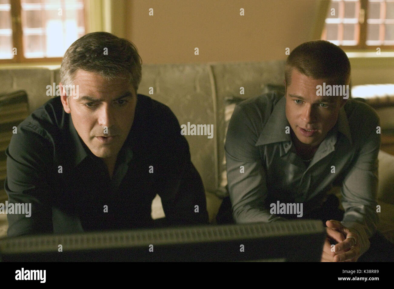 GEORGE CLOONEY and BRAD PITT star in Ocean's Twelve, also starring Matt ...