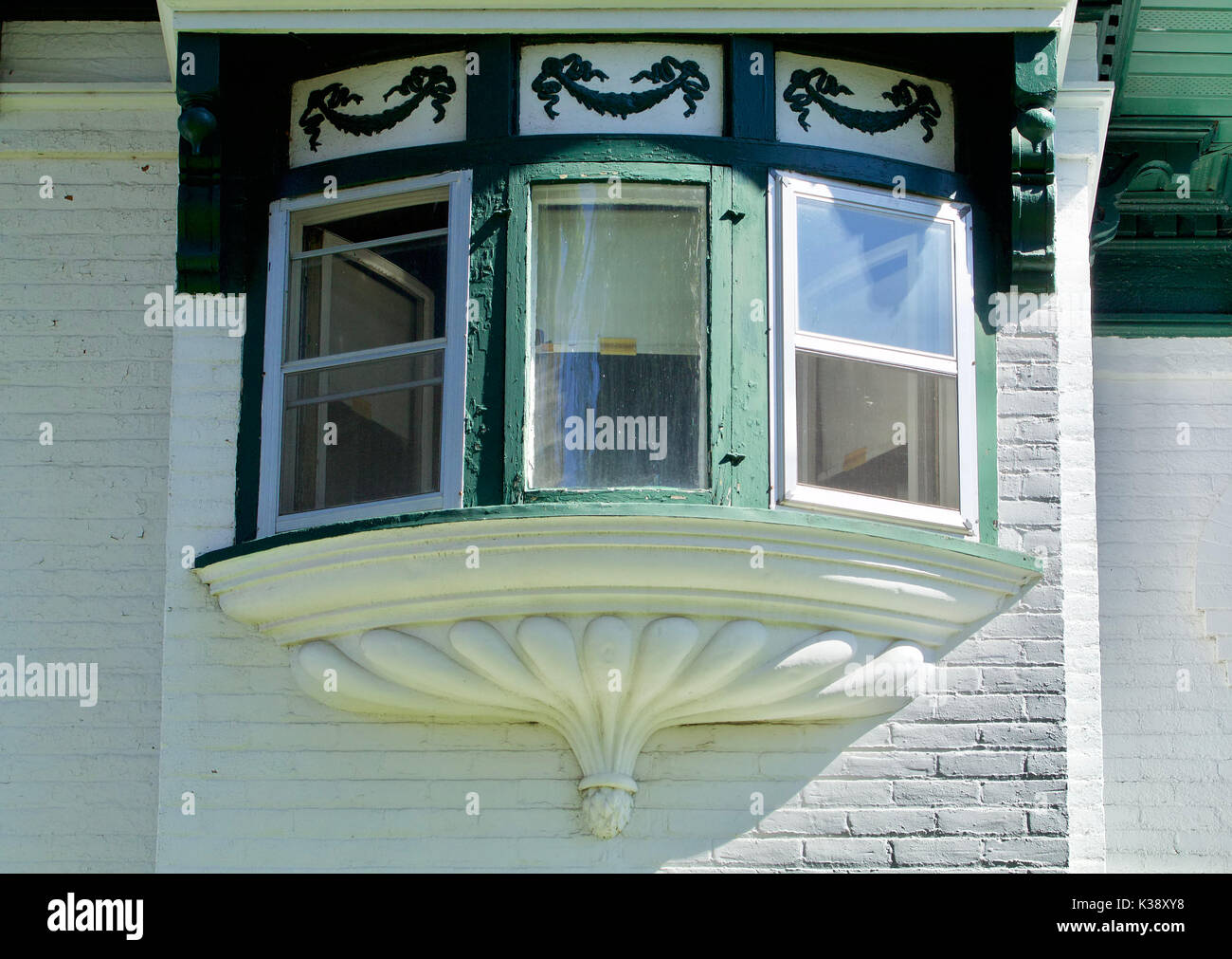 Nineteenth century brick house triple bay window Stock Photo - Alamy