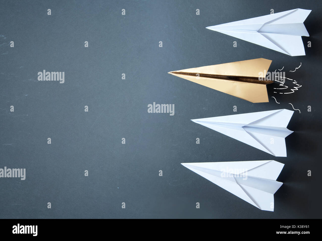 Gold paper plane standing out in a line with background space Stock ...