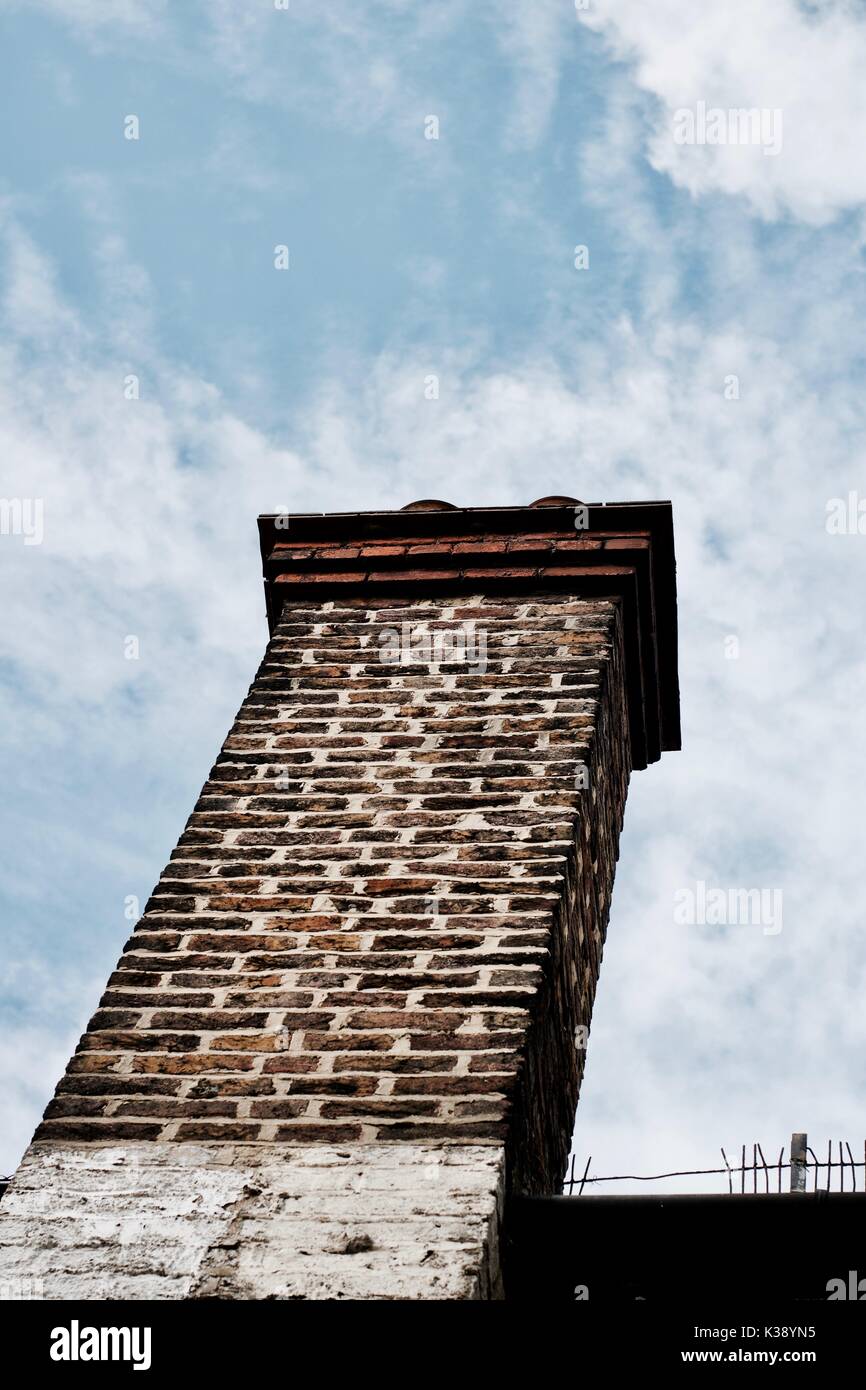 Small brick chimney on the house in London. Old building Stock Photo ...