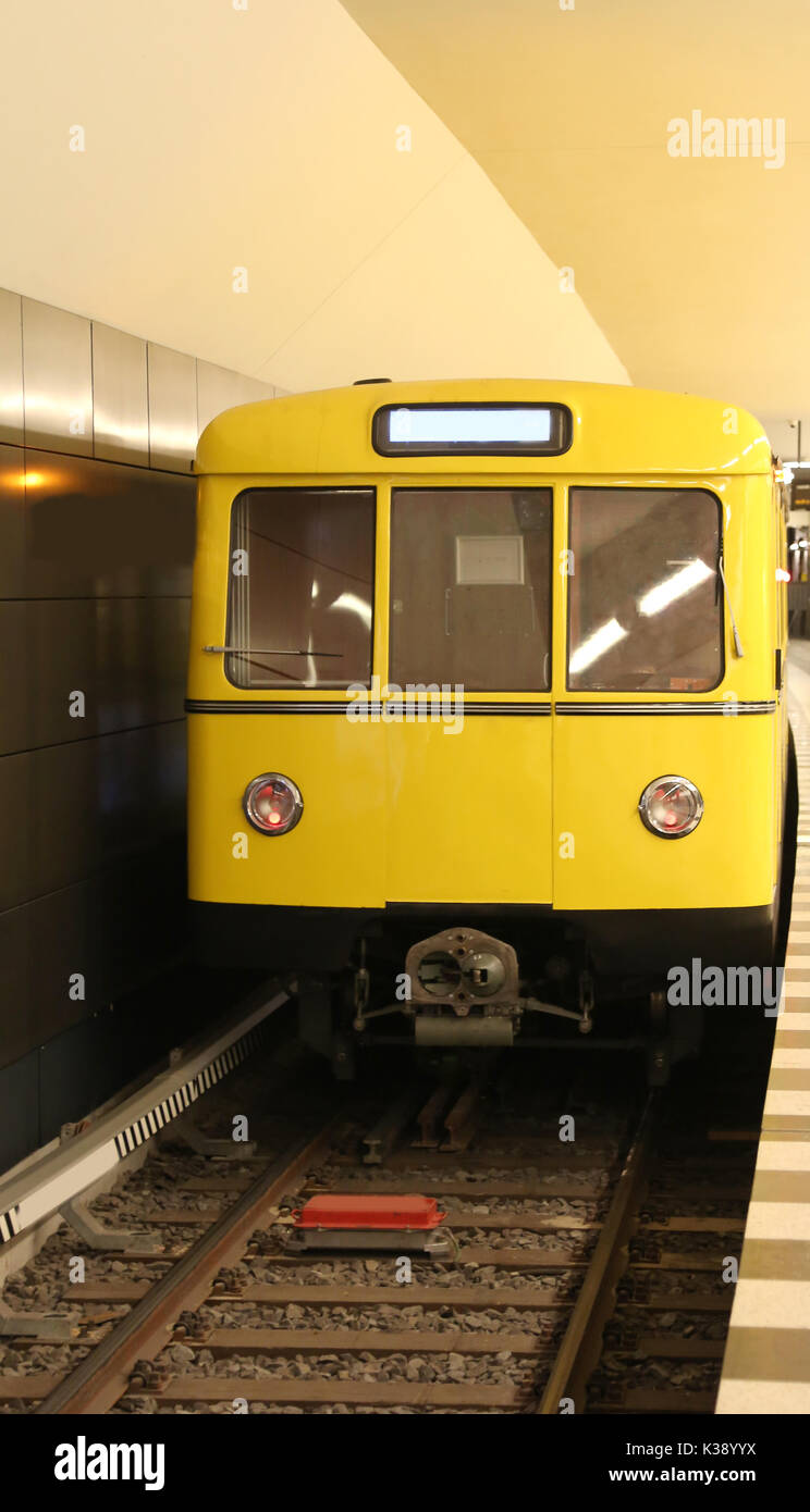 new Yellow metro car stationed at the underground train station Stock ...