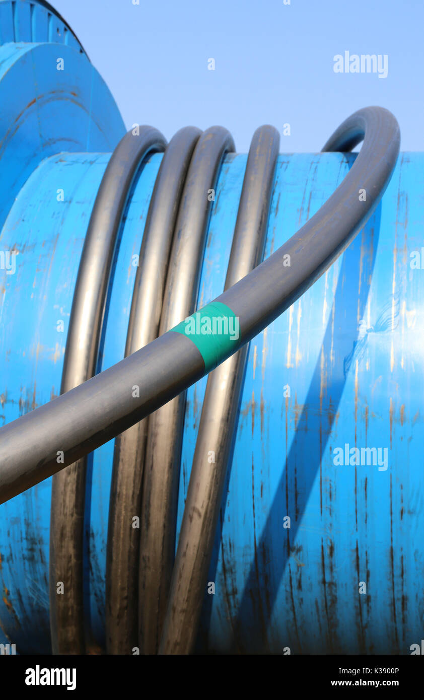 Coil detail with a big high voltage electric cable during the ...