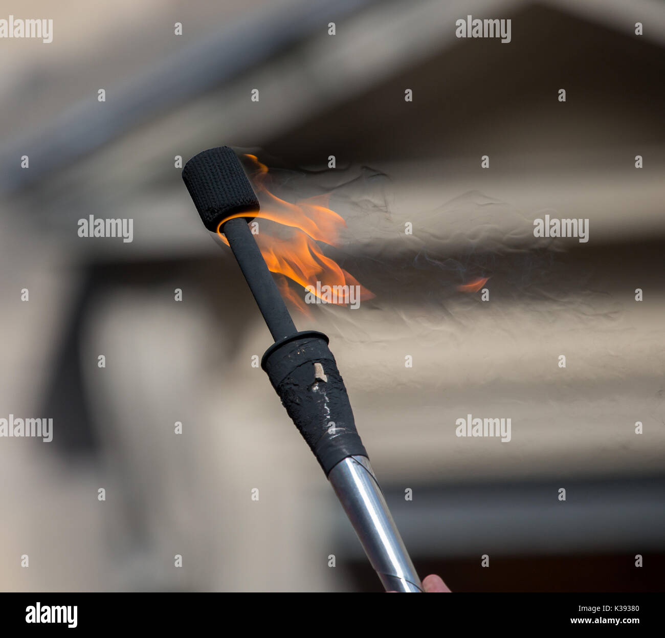 A flaming torch thrown by a fire juggler during the Edinburgh Festival ...