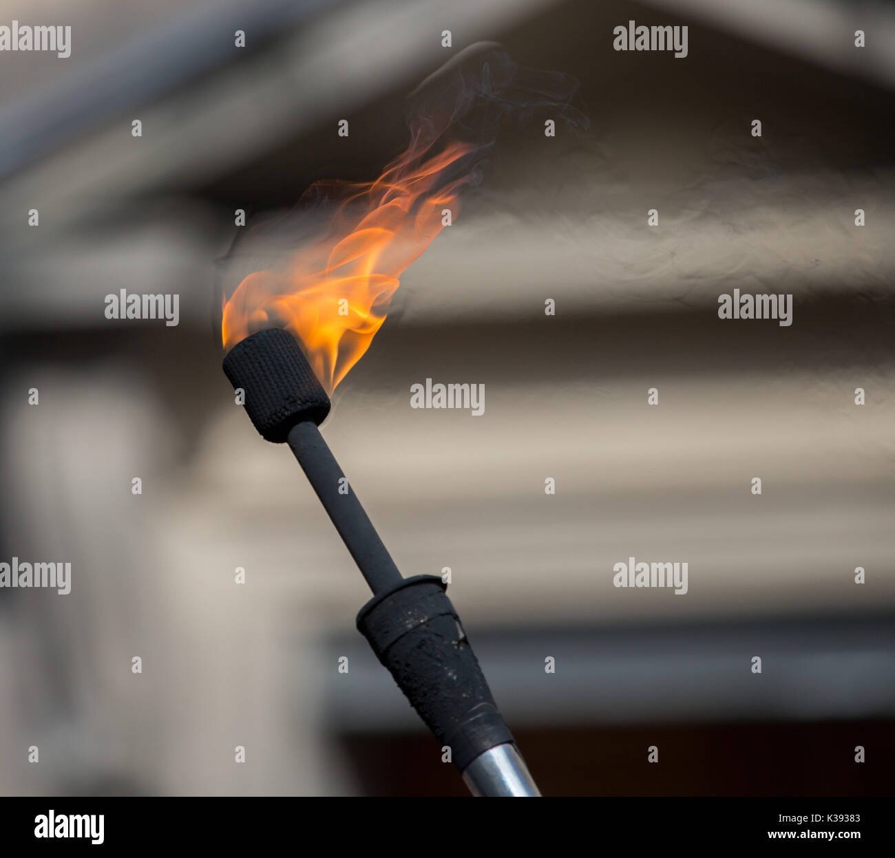 A flaming torch thrown by a fire juggler during the Edinburgh Festival ...