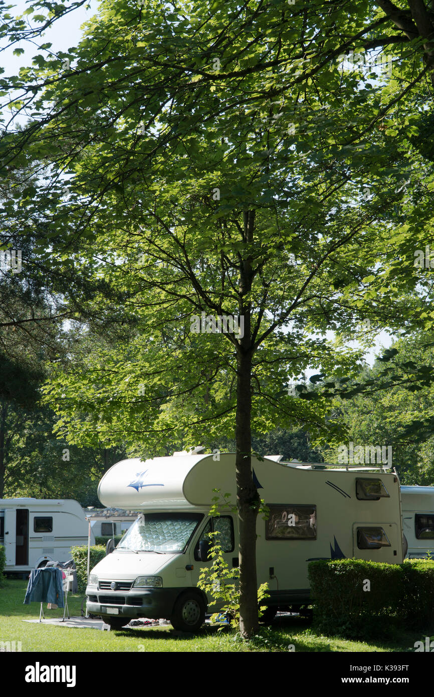 Camper behind leaves hi-res stock photography and images - Alamy