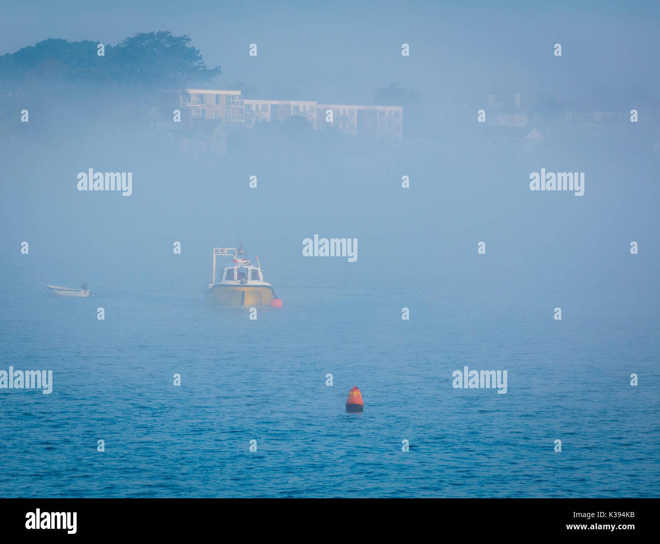 Boats in mist hi-res stock photography and images - Alamy
