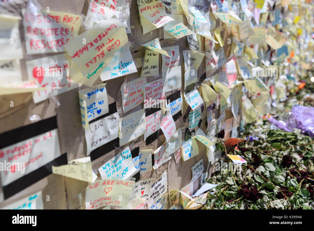 Wall of condolence cards, notes, tributes and flowers at vigil near the ...