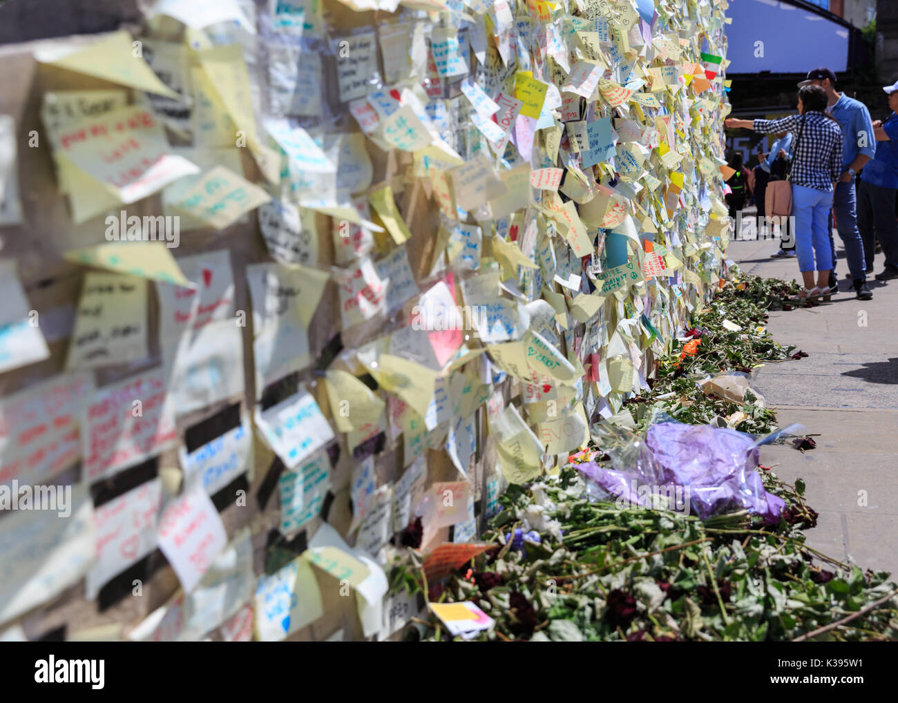 Wall of condolence cards, notes, tributes and flowers at vigil near the ...