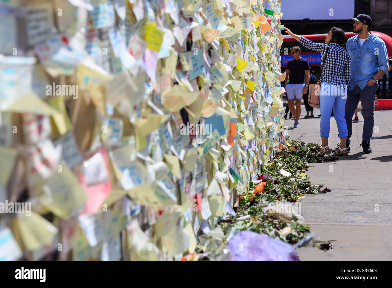 Wall of condolence cards, notes, tributes and flowers at vigil near the ...