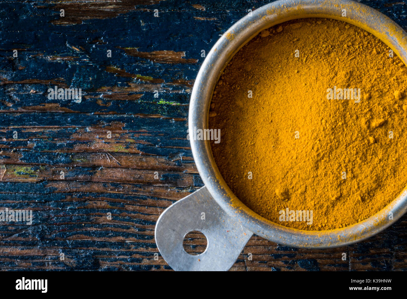 Ground Turmeric Root in a Measuring Cup Stock Photo - Alamy
