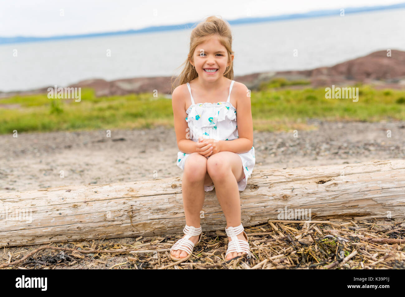 Little girl outdoors at the beach Stock Photo - Alamy
