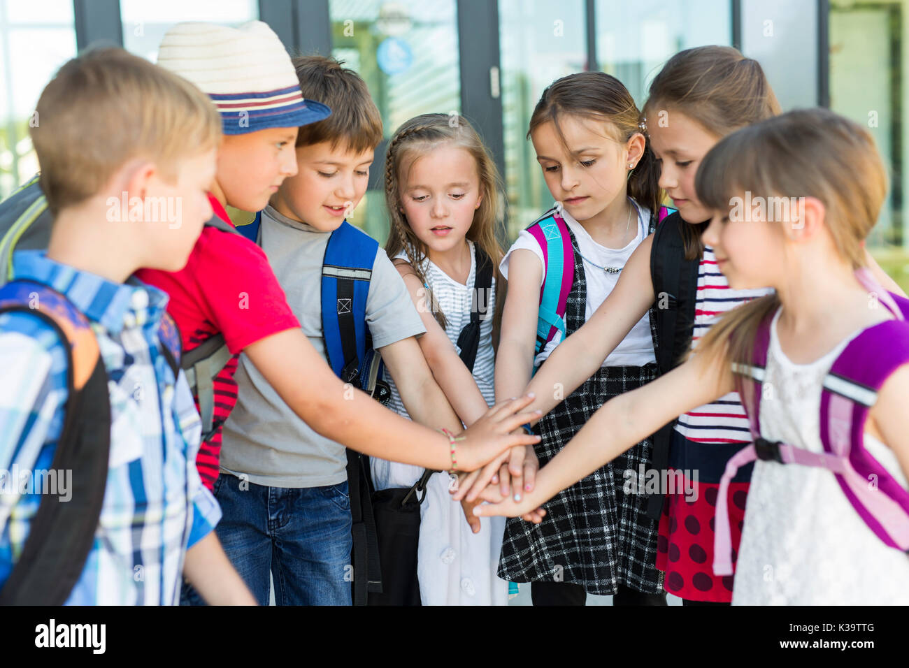Portrait Of School Pupils Outside Classroom Carrying Bags Stock Photo ...