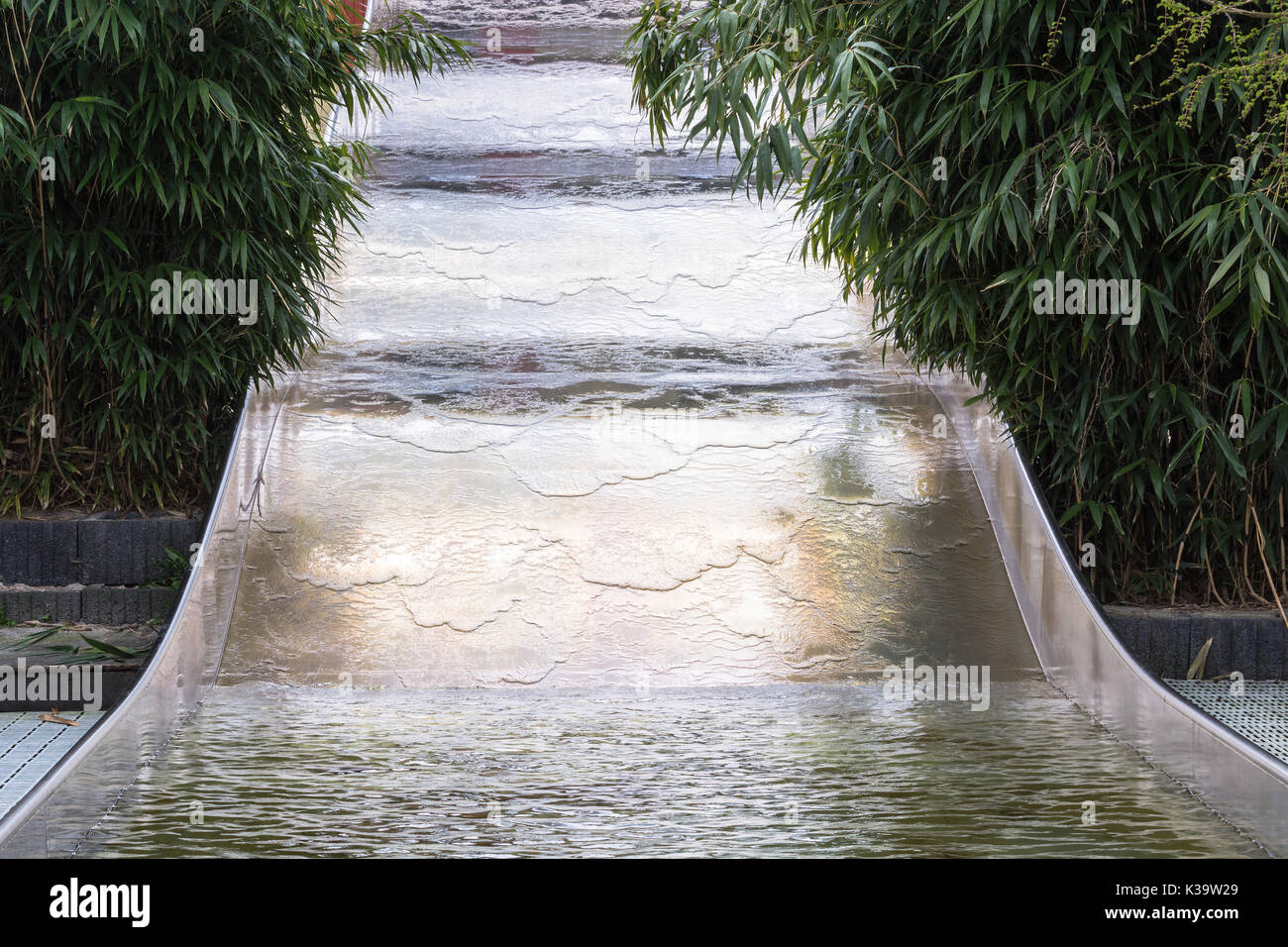 Water slide stainless steel Stock Photo - Alamy