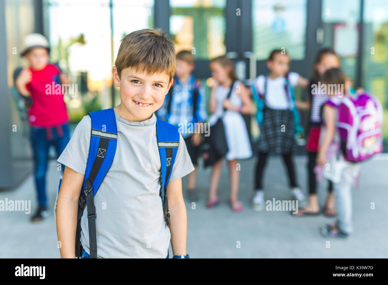 Children carrying school bag hi-res stock photography and images - Alamy