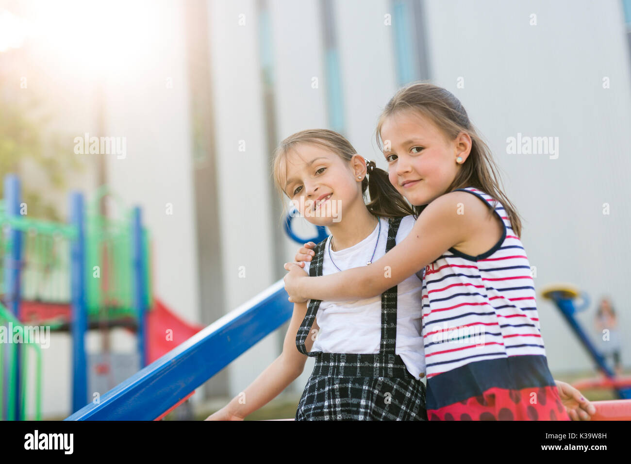 cheerful school age child play on playground school Stock Photo - Alamy