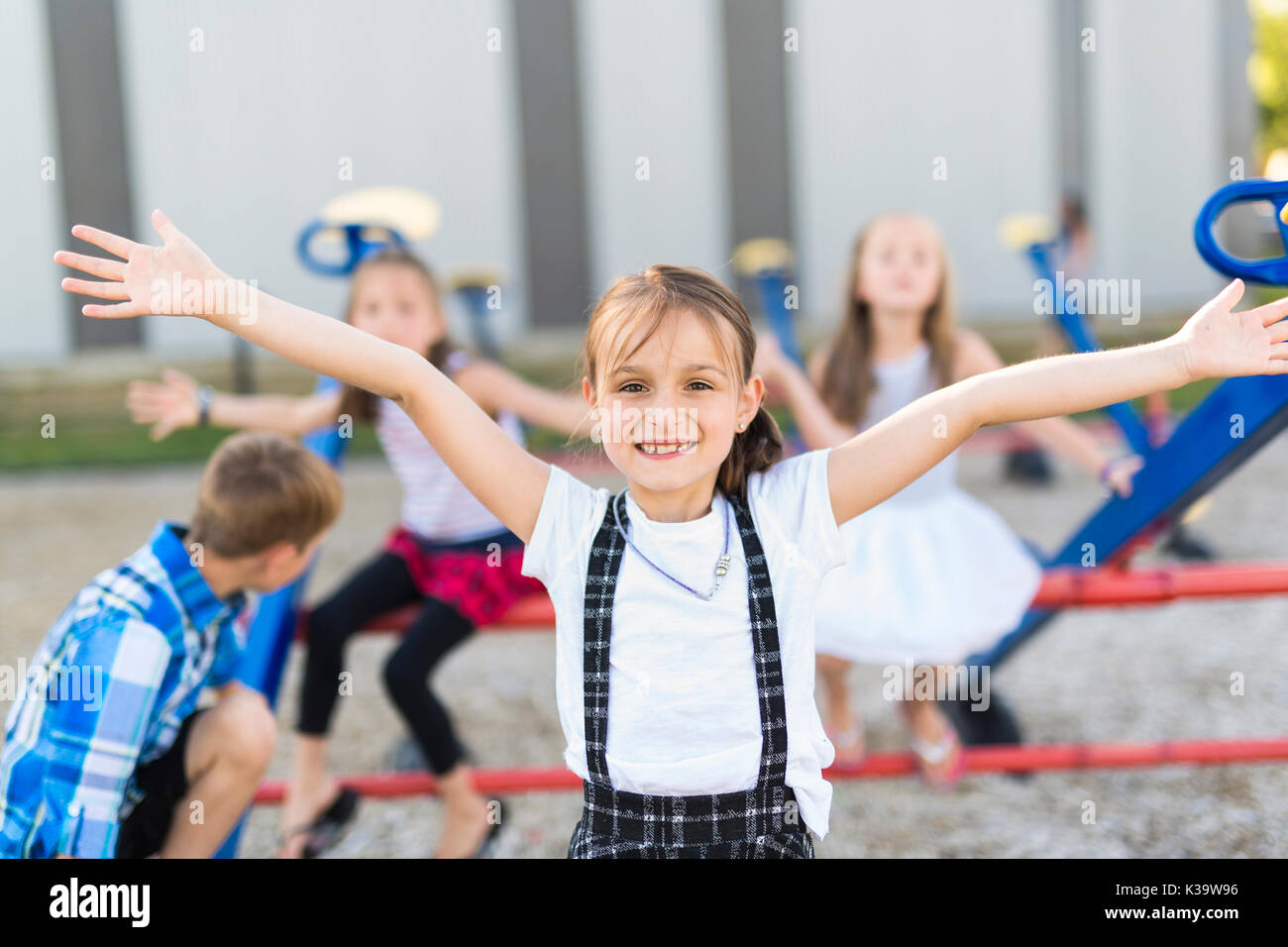 cheerful school age child play on playground school Stock Photo - Alamy