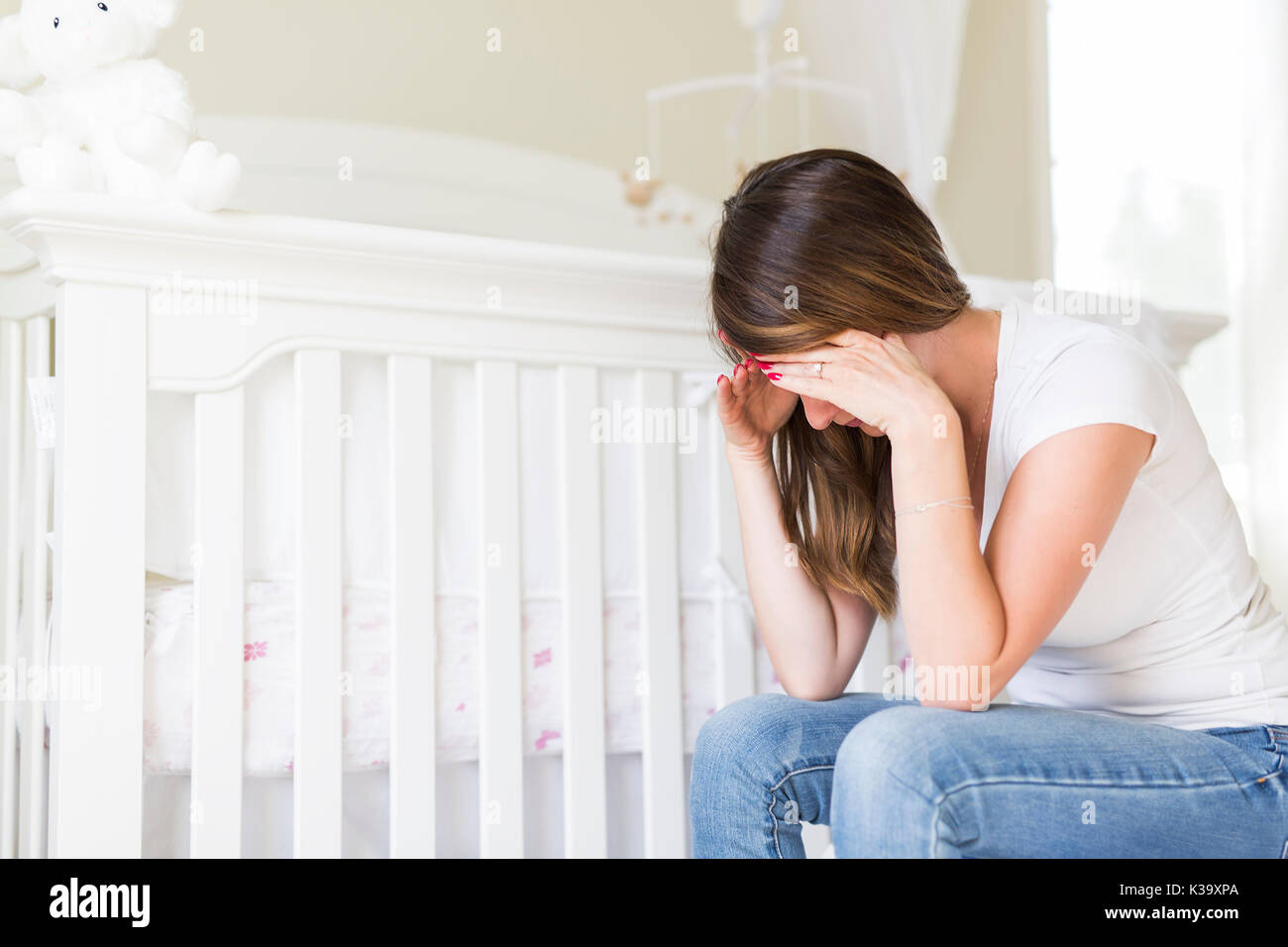Depressed mother and infant hi-res stock photography and images - Alamy