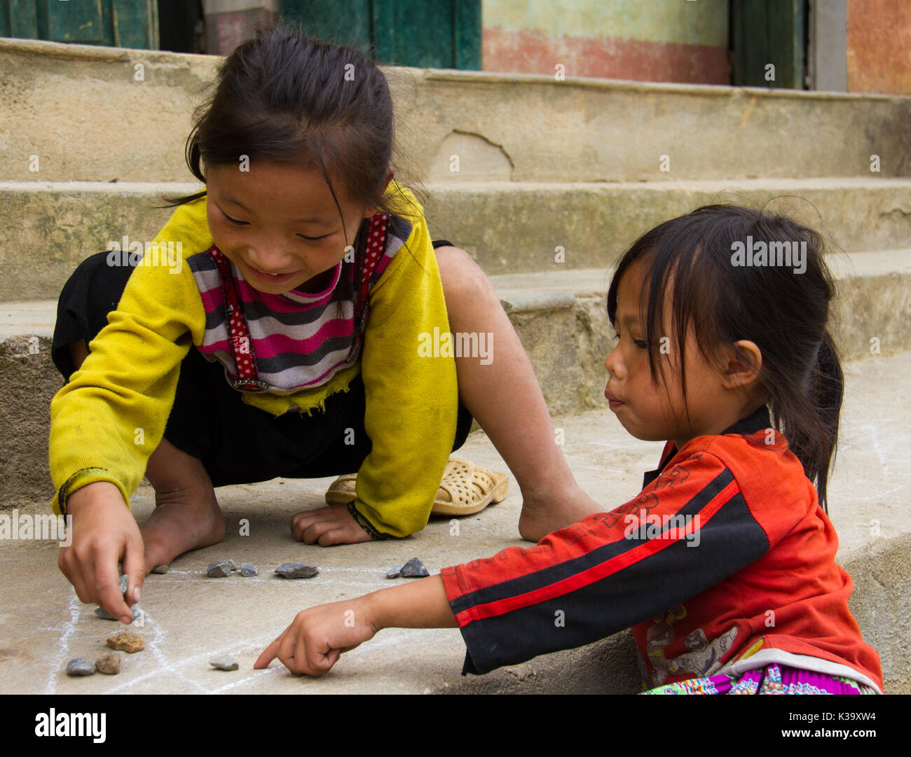 Children play game with chalk and rocks in North Vietnam on Oct 21 ...