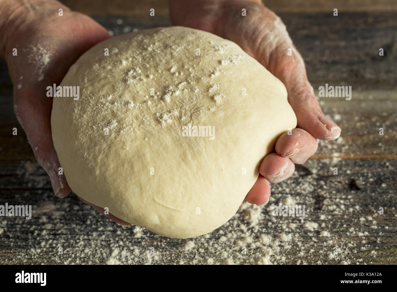 Handmade Organic Bread Dough in a Womans Hands Ready to Bake Stock ...