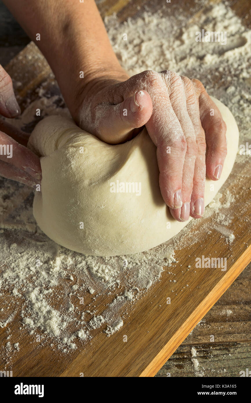 Handmade Organic Bread Dough in a Womans Hands Ready to Bake Stock ...
