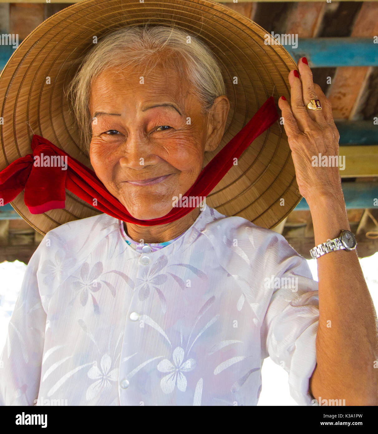 Vietnamese woman says hello in Hue on Oct 26, 2011 Stock Photo - Alamy