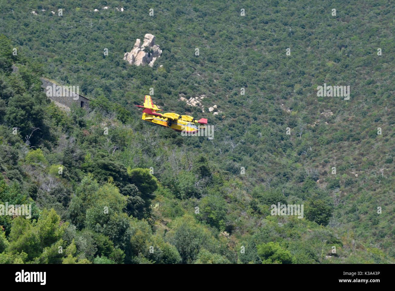 firefighter flying over a forest by helping Stock Photo - Alamy