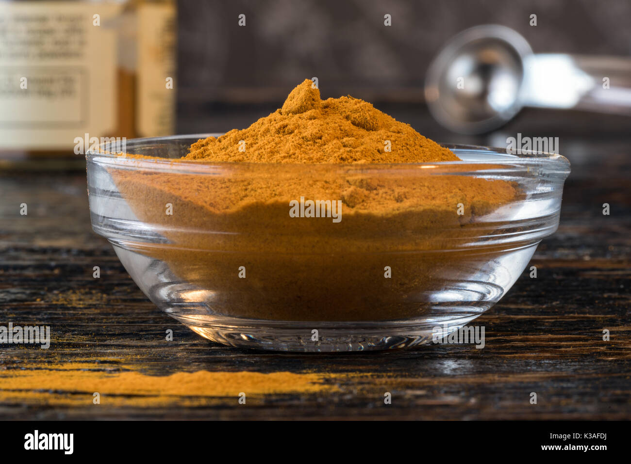 Ground Turmeric Root in a Bowl Stock Photo - Alamy