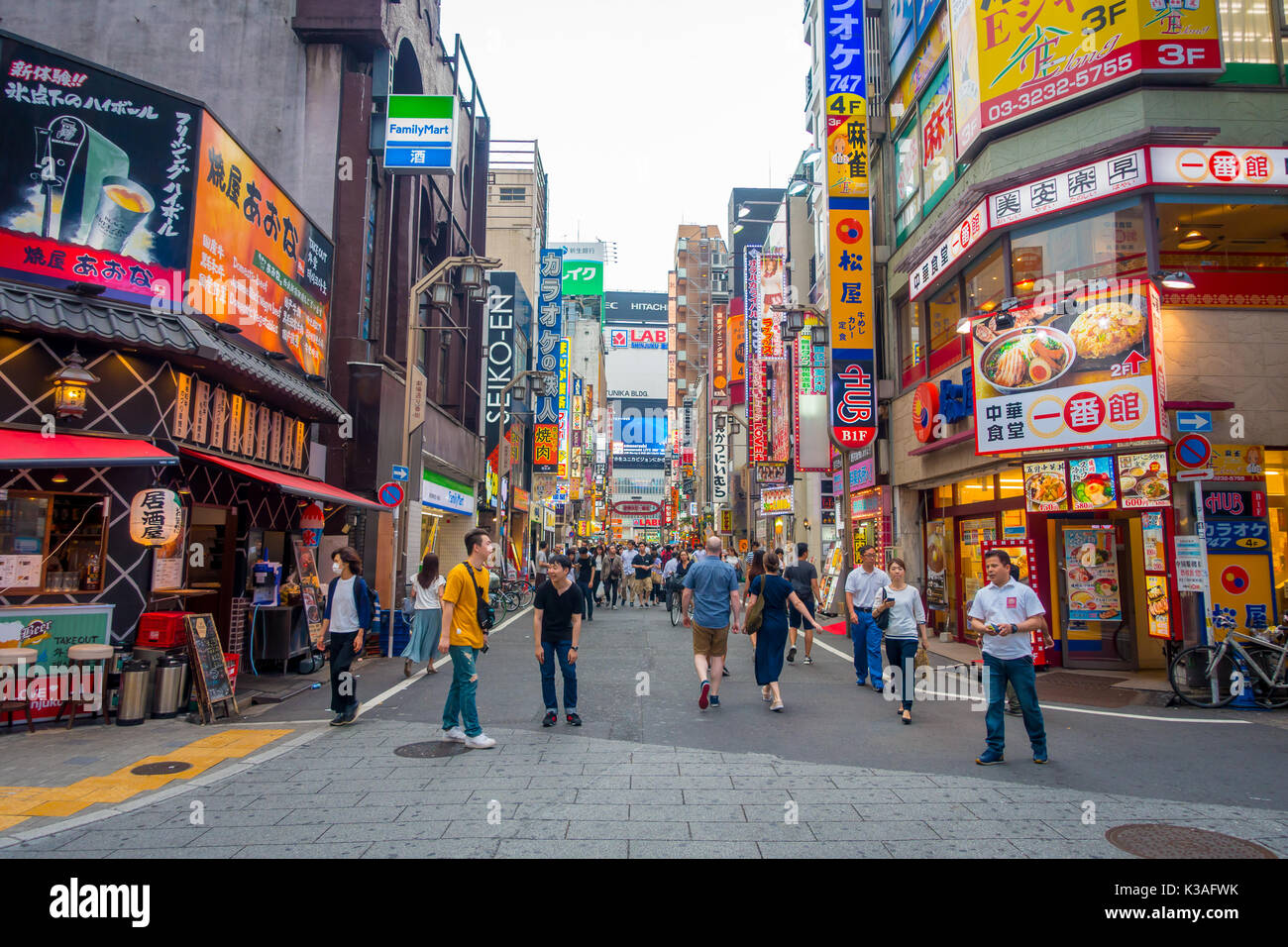 TOKYO, JAPAN JUNE 28 - 2017: Crowd of people walking and enjoying the ...