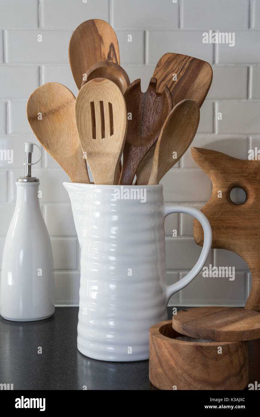 Wood Kitchen Utensils in Pitcher Stock Photo - Alamy