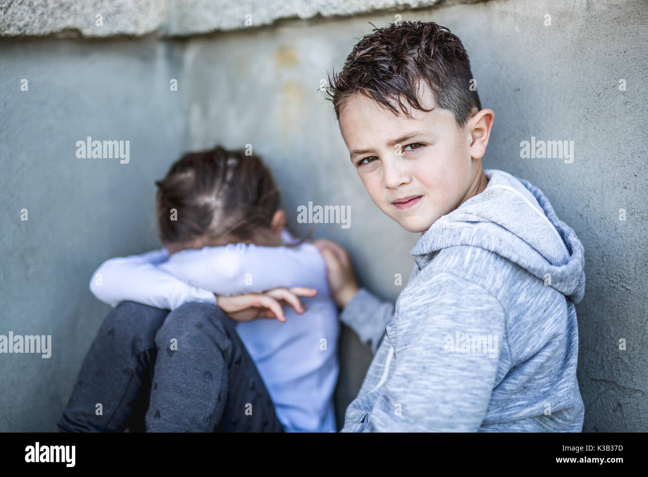 six years old sad school at the schoolyards Stock Photo - Alamy