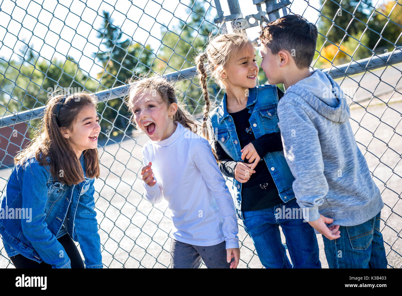 students outside school standing together Stock Photo - Alamy
