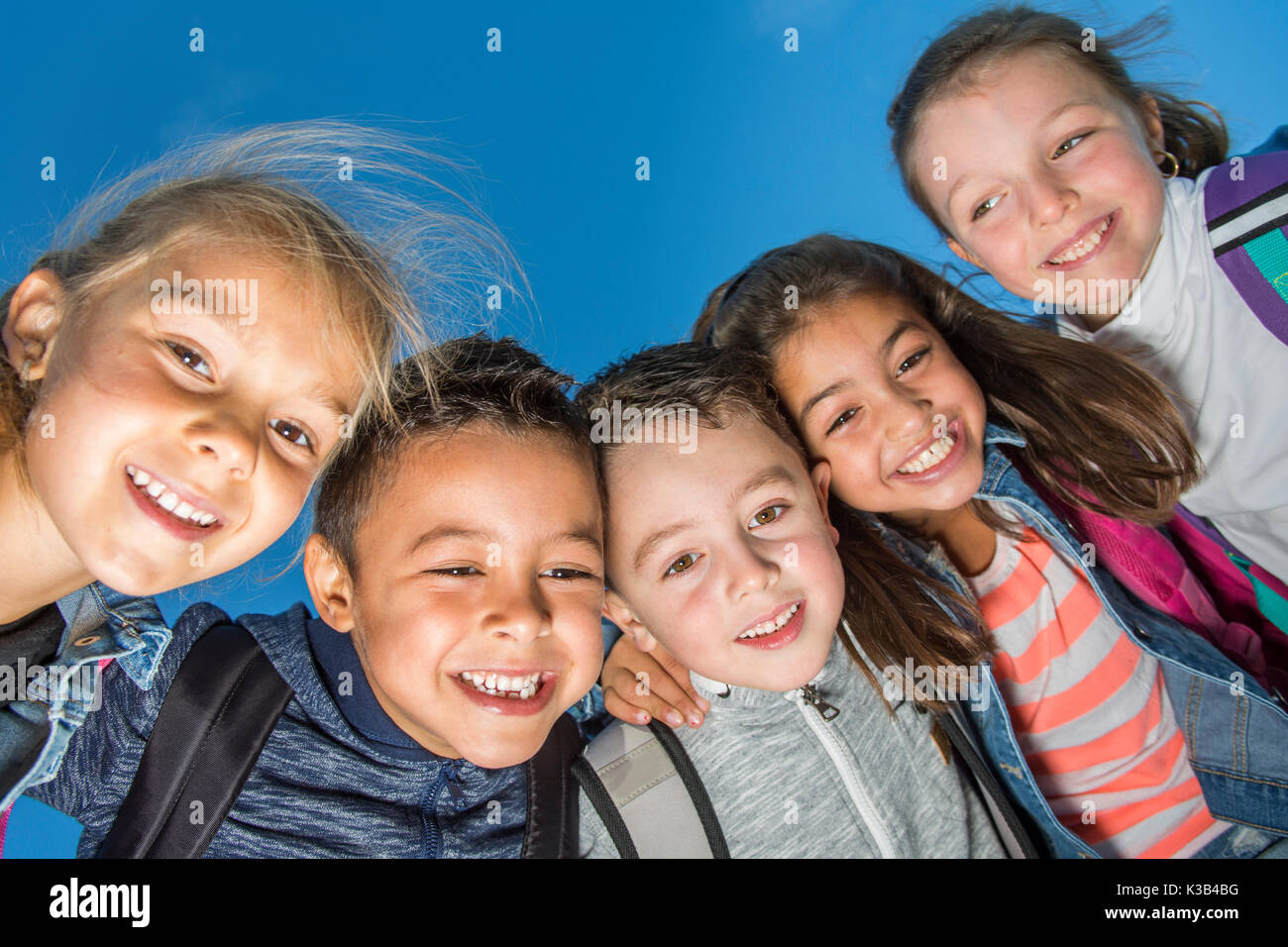 Four Students Outside School Standing High Resolution Stock Photography ...