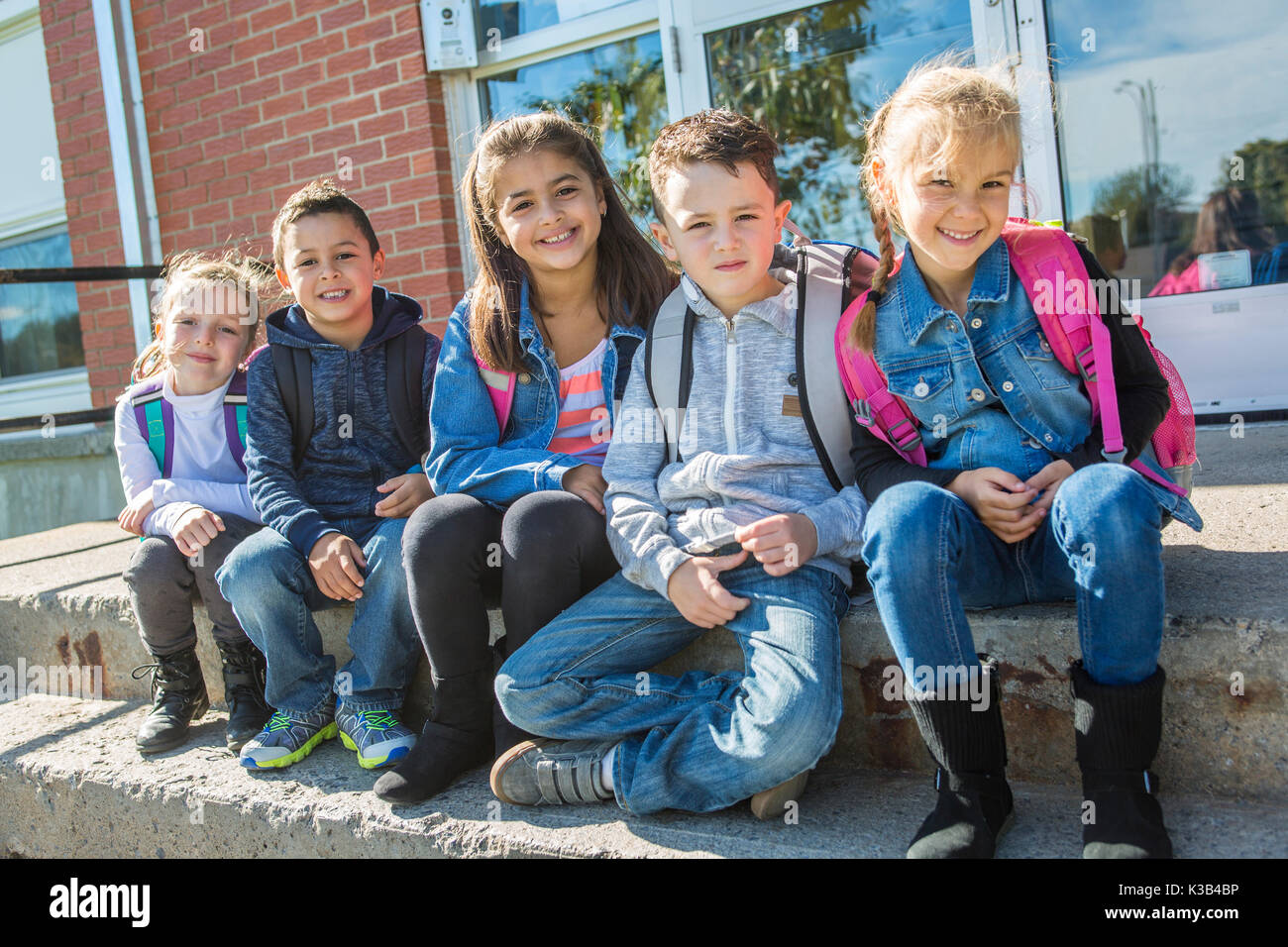 students outside school standing together Stock Photo - Alamy