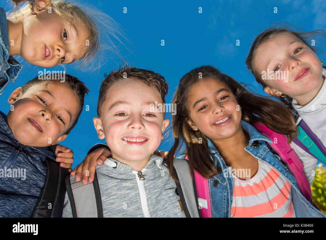 students outside school standing together Stock Photo - Alamy