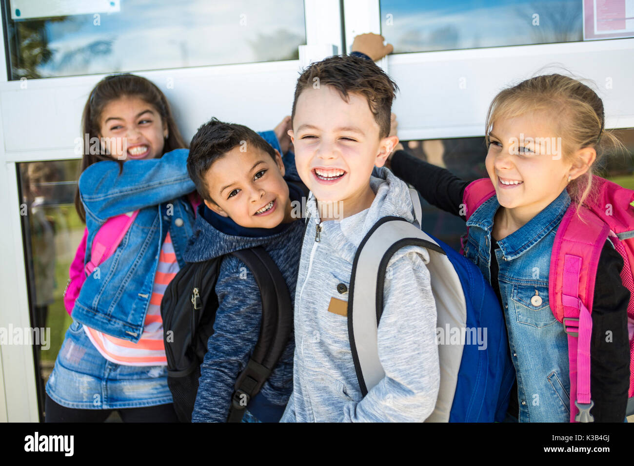 students outside school standing together Stock Photo - Alamy